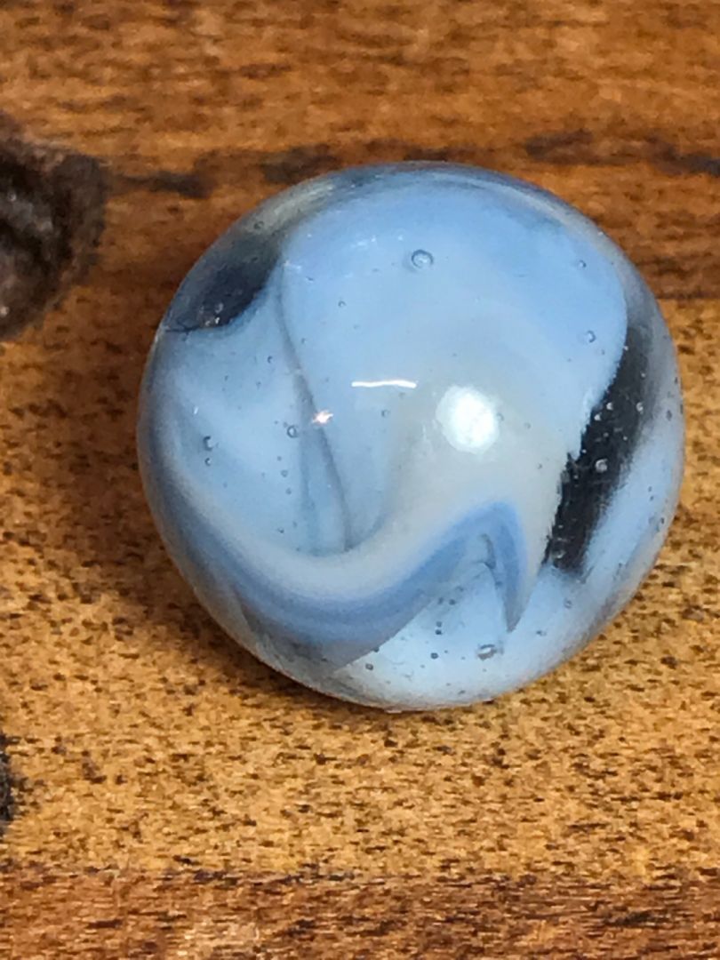 Clear base Transparent Swirl - Marble I.D.'s - Marble Connection