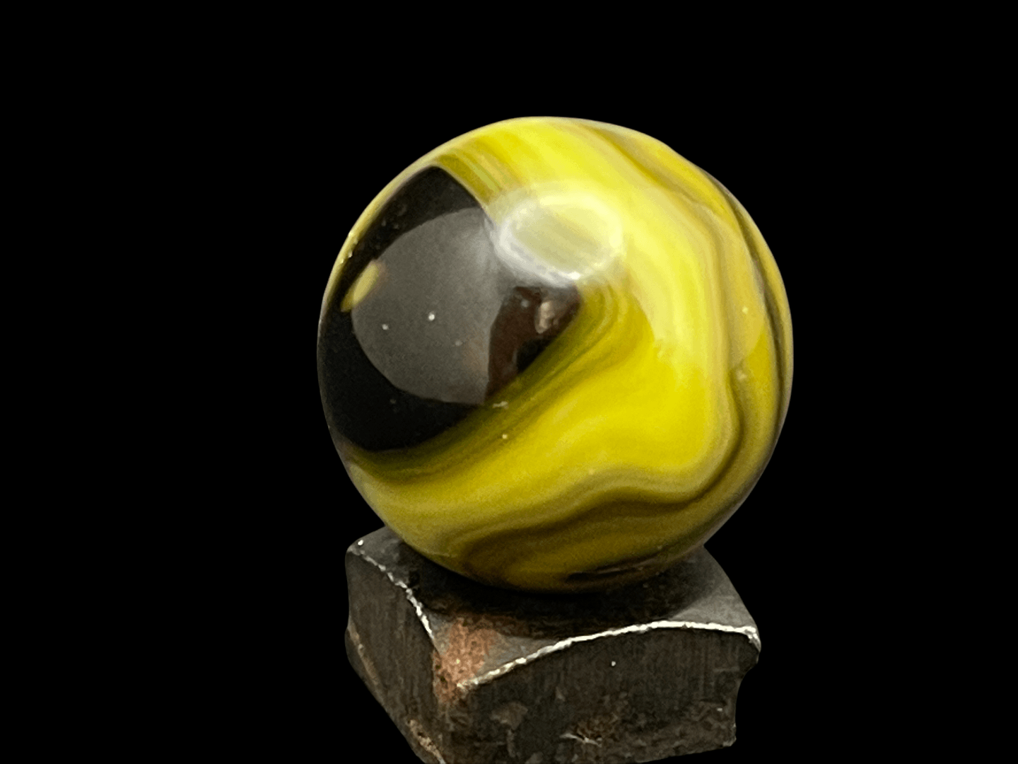 yellow and black swirl .60 - Marble I.D.'s - Marble Connection