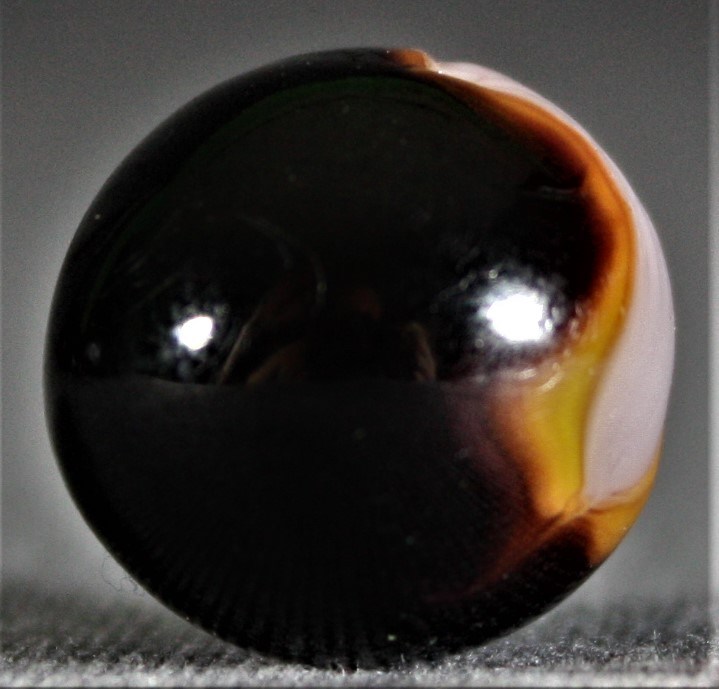 Black, Orange, White and Weird - Marble I.D.'s - Marble Connection