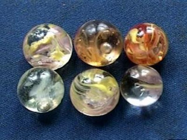 Am I looking at a cobra guinea? - Marble I.D.'s - Marble Connection