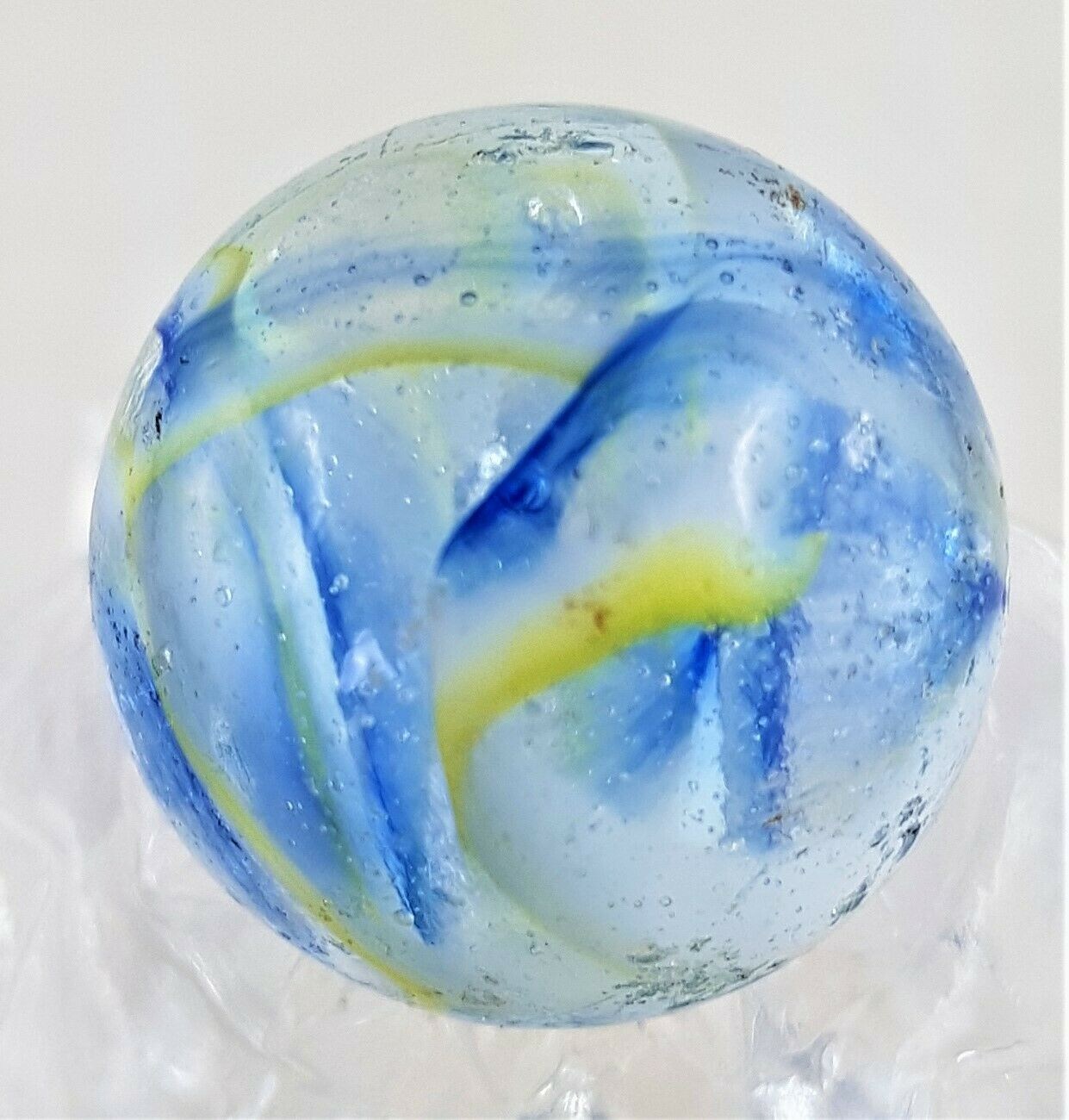 Is this a Christiansen marble....gone bananas looking at so much in ...